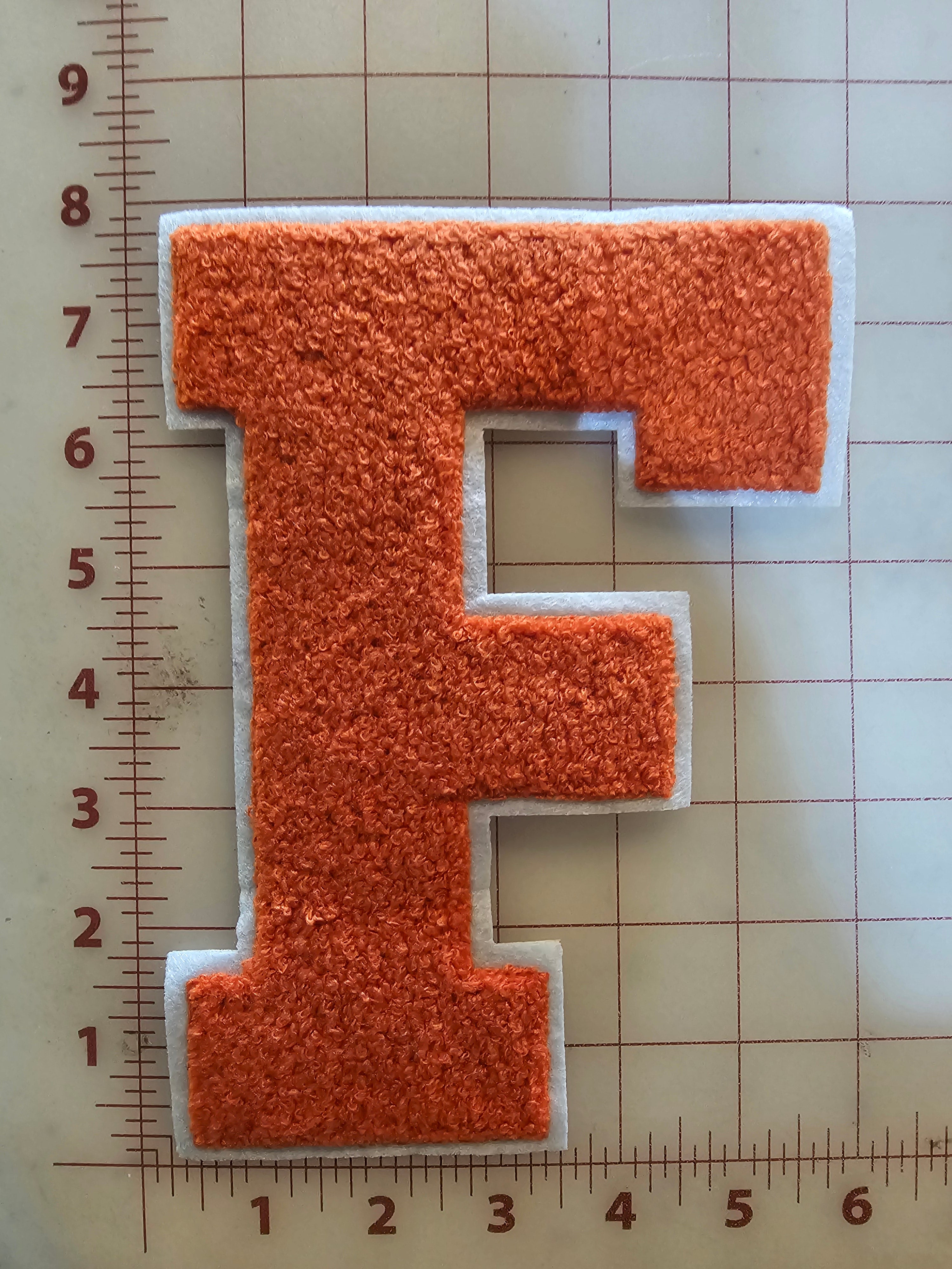 L003 - Orange Letter F – 4Klub by W.E. Lusain