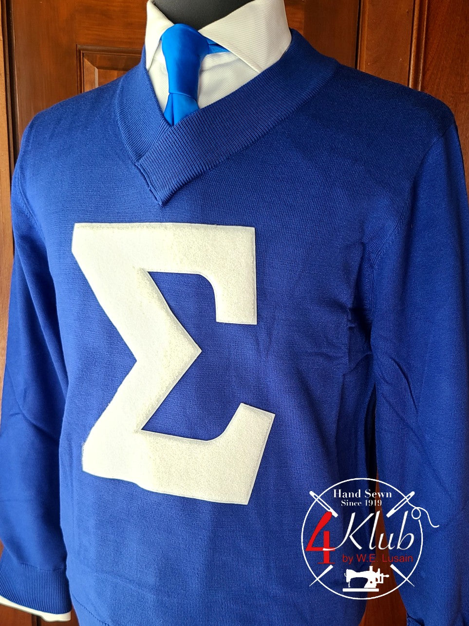 White Sigma / Blue V-neck – 4Klub by W.E. Lusain